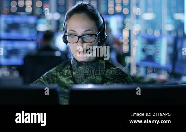 Female Military Technical Support Professional Gives Instructions into ...