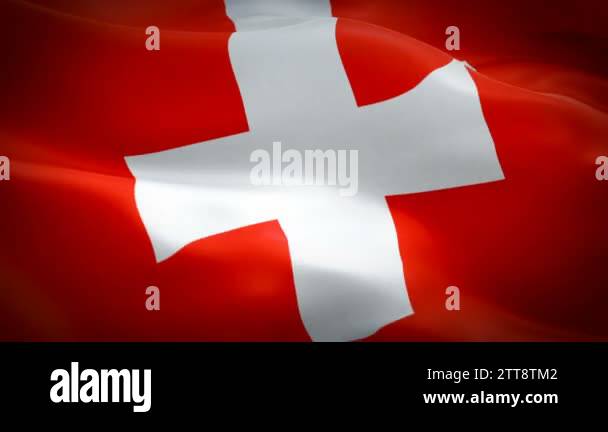Swiss flag Closeup 1080p Full HD 1920X1080 footage video waving in wind ...