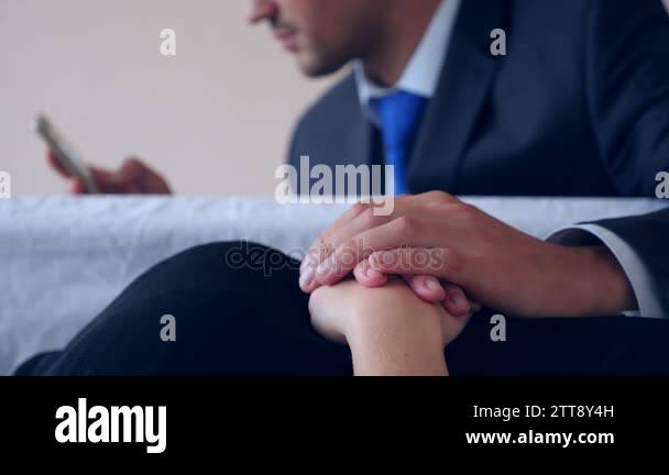 funeral, sadness and mourning concept - a sad man talking and crying ...