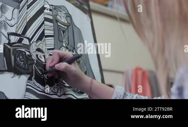 Young Beautiful Female Artist is in an Art Studio, Sitting Behind an ...