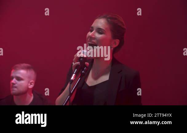 Girl in red singer Stock Videos & Footage - HD and 4K Video Clips - Alamy