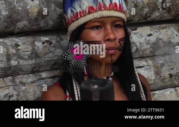 Indigenous Woman Smoking Pipes in a Tupi Guarani Tribe, Brazil Stock ...