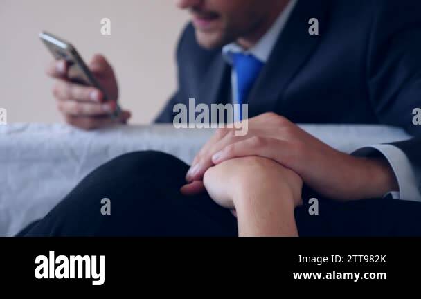 funeral, sadness and mourning concept - a sad man talking and crying ...