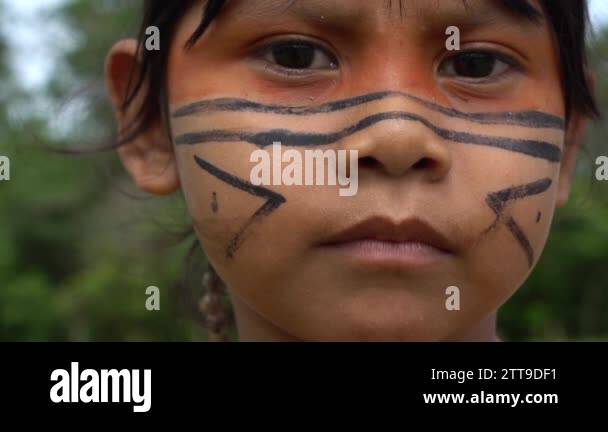 Closeup face of Native Brazilian children at an indigenous tribe in the ...
