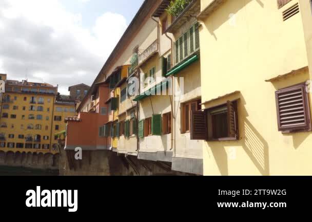 Beautiful Italian style buildings at Ponte Vecchio Bridge in Florence ...