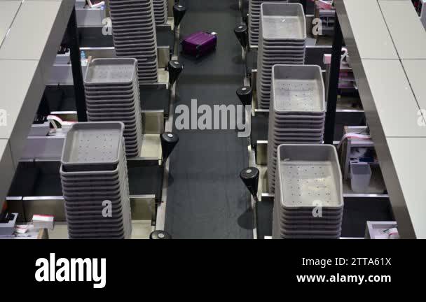 Conveyor belt security check in Stock Videos & Footage - HD and 4K ...