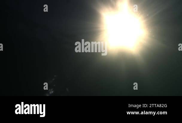 Underwater sea scene view with natural light rays, shining through the ...