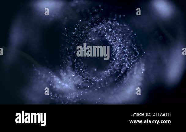 Motion graphics background. Abstract blue particles affected by ...