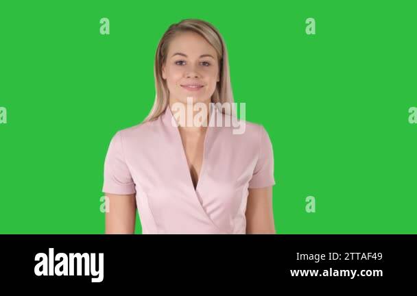 Beautiful toothy smile of lovely woman in pink on a Green Screen ...