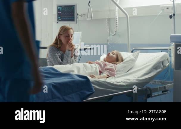 Sick Little Girl Lying in the Hospital Bed Sleeping, Her Mother Worries ...