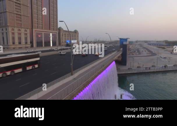 Aerial. Illuminated Waterfall at the Sheikh Zayed Bridge. Dubai Water ...