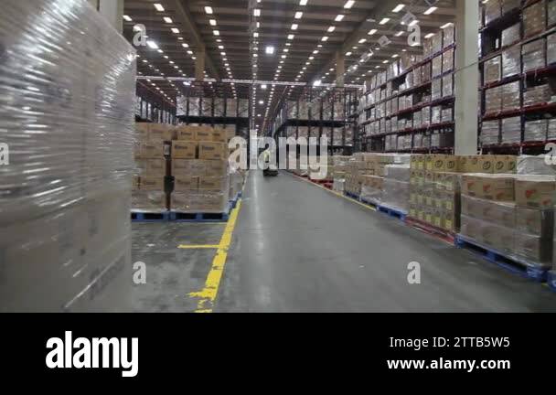 Man riding cart in warehouse Stock Videos & Footage - HD and 4K Video ...