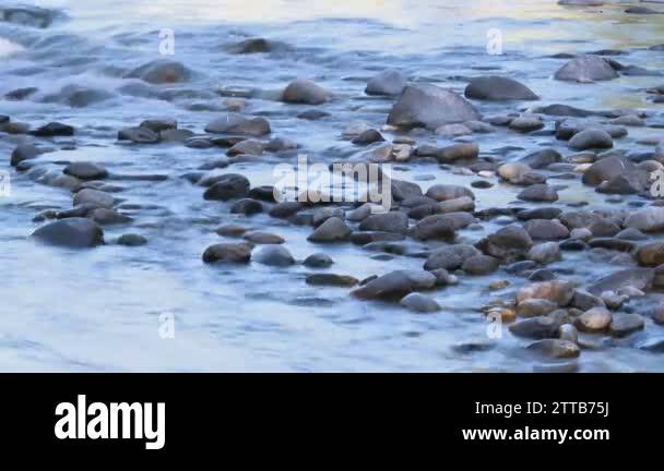 Smooth river rocks Stock Videos & Footage - HD and 4K Video Clips - Alamy