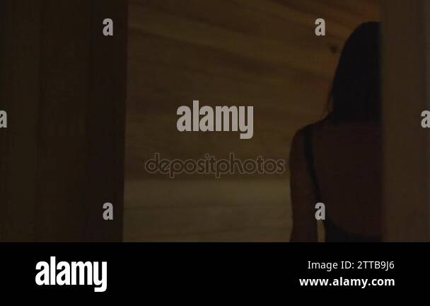 Two attractive girls in swimwear are relaxing in a steam bath in spa ...