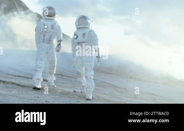 Two Astronauts in Space Suits Confidently Walking on Frozen Alien Planet, Exploration Expedition ...