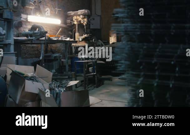 Old dusty workshop with workbench and a milling machine at plant of ...