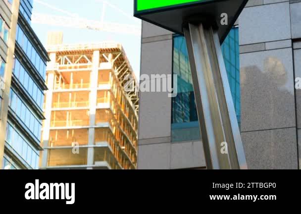 Led hoarding on the exterior of building. Green screen display on the ...