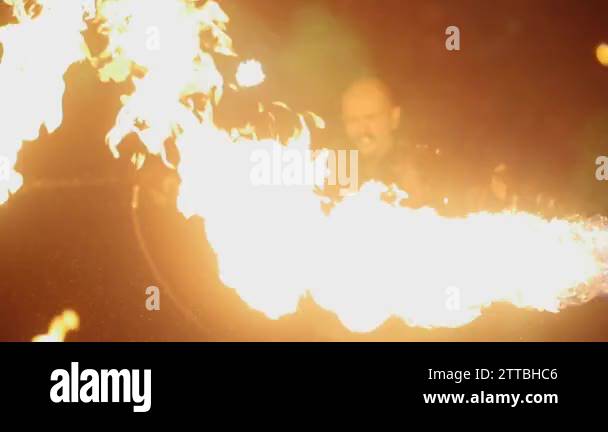 the stuntman releases a circle from the flamethrower. Action in ...