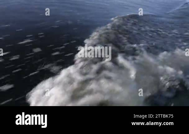 Wave from the bow of a motor boat. The sound of water and motor ...