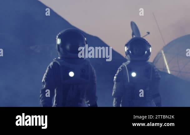 Male and Female Astronauts wearing Space Suits Explore Violet Alien ...