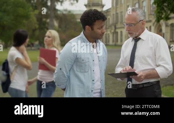 Teacher praising student Stock Videos & Footage - HD and 4K Video Clips ...