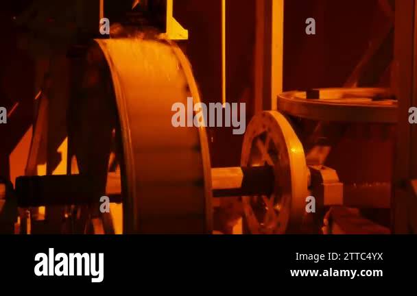 Historic water mill model with a spinning wheel, pouring water and cogs ...