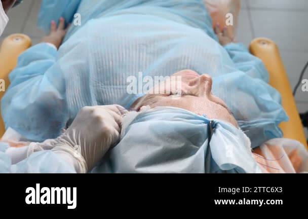 Beauty surgical operation to hide signs of aging. Flaccid face skin ...