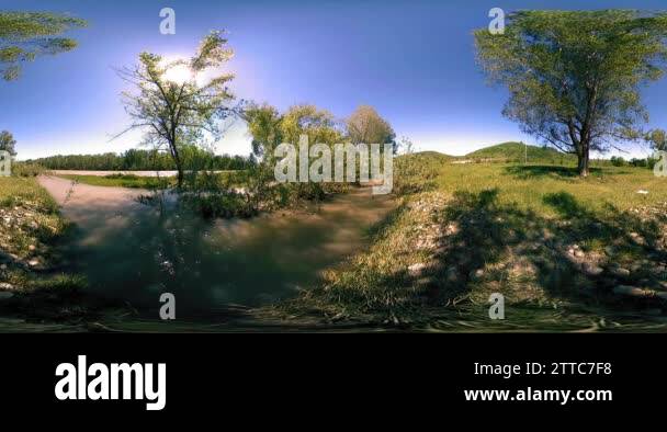 UHD 4K 360 VR Virtual Reality of a river flows over rocks in beautiful ...