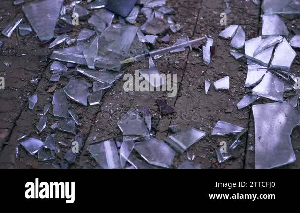 syringe falling down spraying blood after a heroin cocaine injection on ...