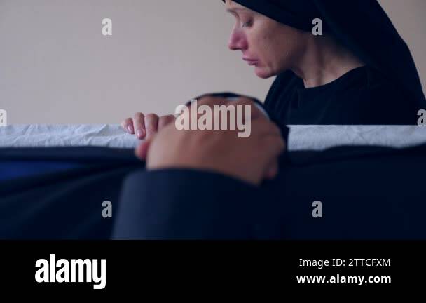 funeral, sadness and mourning concept - sad woman talking and crying ...