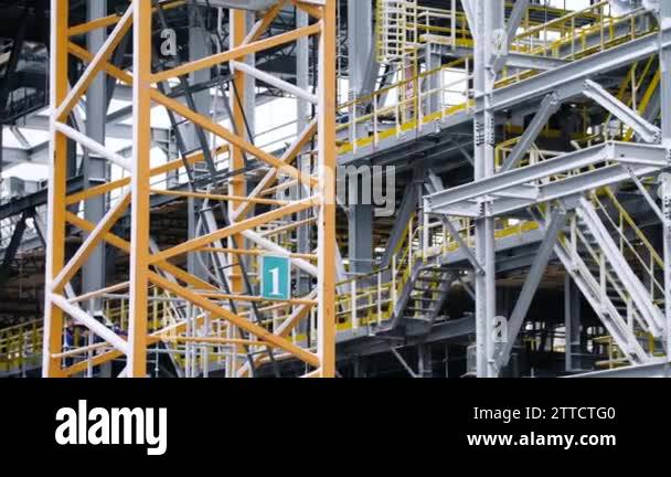 Scaffolding installation at a tank with process structures of refinery ...