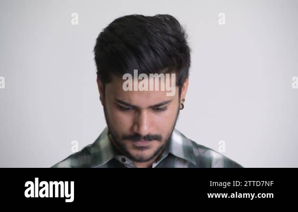 Face of young angry bearded Indian man screaming and shouting Stock ...