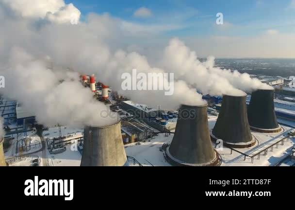 Industrial chimneys throwing Smoke in the Sky. Air Pollution concept ...