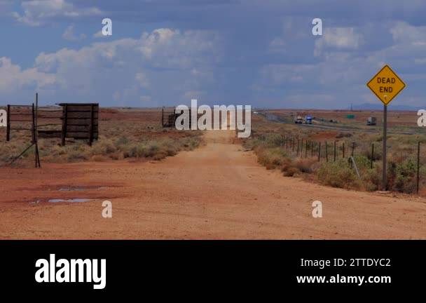 Dead end dirt road with sign near Interstate 40 (I-40) US highway in ...