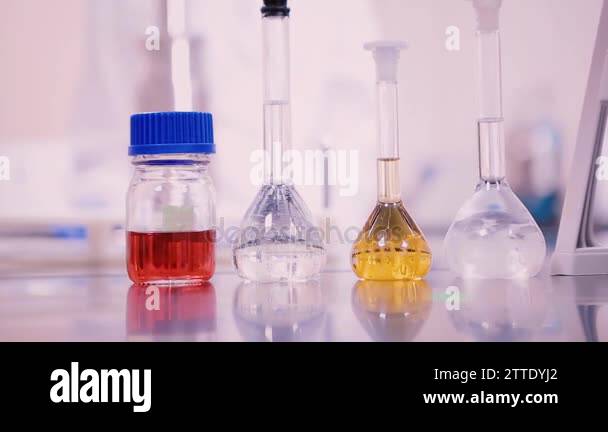 Different laboratory beakers glassware Stock Videos & Footage - HD and ...