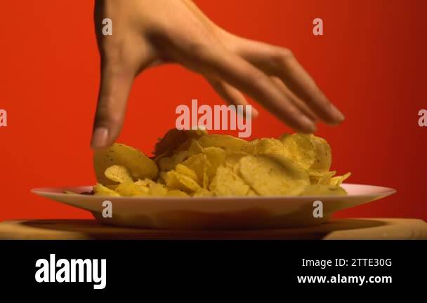 Hand grabbing junk food Stock Videos & Footage - HD and 4K Video Clips ...