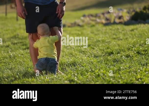 Help child stand up Stock Videos & Footage - HD and 4K Video Clips - Alamy