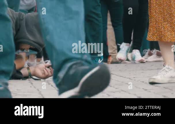 Homeless Beggar Man with a Hat on the Sidewalk Begs for Alms from ...