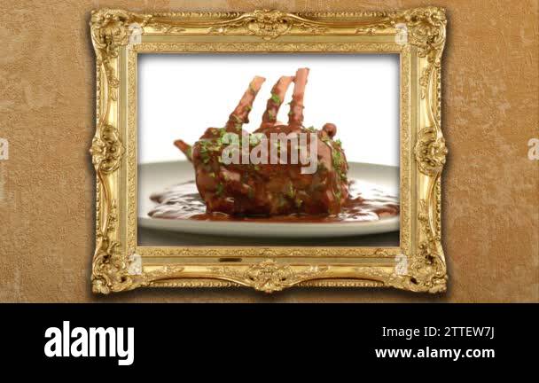 Cinemagraph- exhibition golden frame with close-up of juice roasted ...