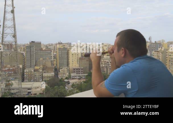 Man looking through spyglass Stock Videos & Footage - HD and 4K Video ...