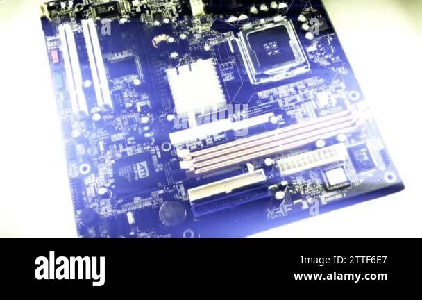 computer main board,electronic circuit & tech blue rays light rotating ...