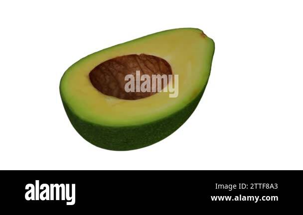 Realistic render of a rotating green Florida avocado (cut in half) on ...