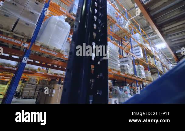 Racks and shelves in a warehouse. Warehousing concept. 4K Stock Video ...