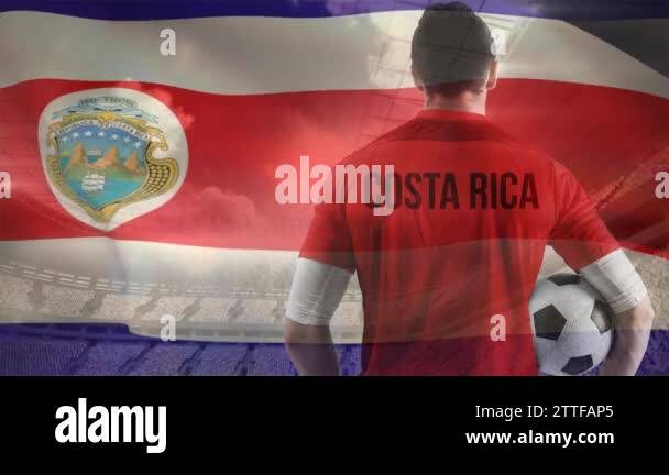 Costa rican football player with football ball in his hands in front of ...