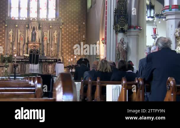 Catholic funeral mass Stock Videos & Footage - HD and 4K Video Clips ...