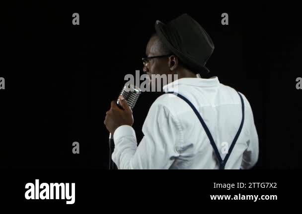 Back view black man performing Stock Videos & Footage - HD and 4K Video ...