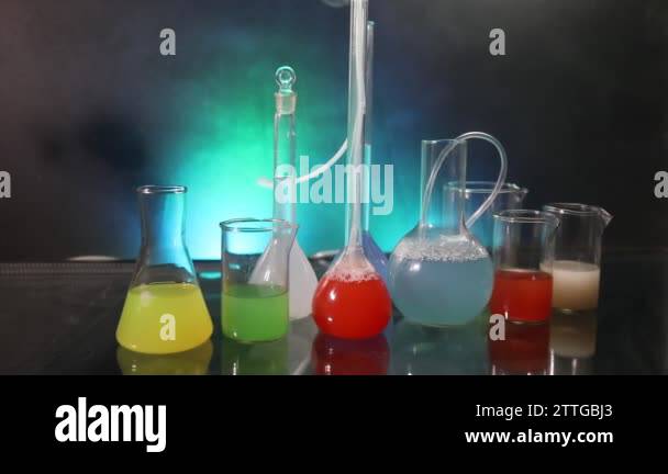 Pharmacy and chemistry theme. Test glass flask with solution in ...