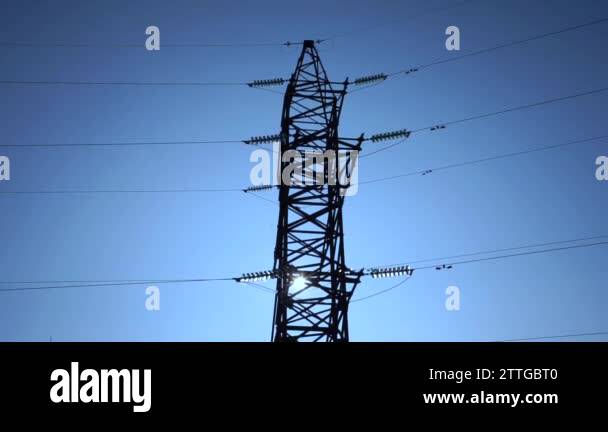 High voltage electric transmission line and pylon against cityline and ...