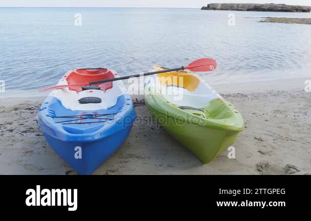 Two kayaks on beach Stock Videos & Footage - HD and 4K Video Clips - Alamy