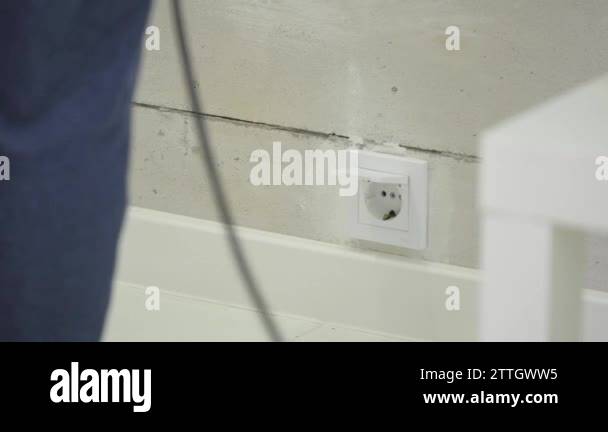Plugging electrical cord cable socket Stock Videos & Footage - HD and ...